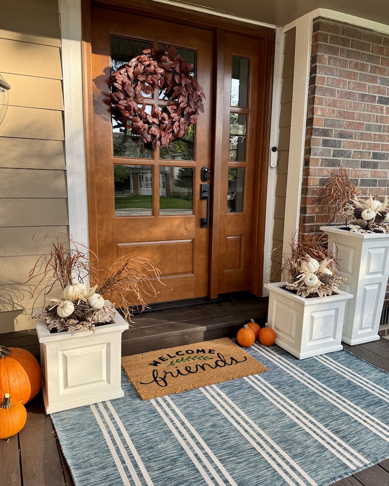 The Most Festive Autumn Front Porch with Fall Planters - All in Stripes